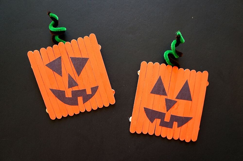 Halloween Popsicle Stick Pumpkins Craft - A Fun Jack-O-Lantern Project!